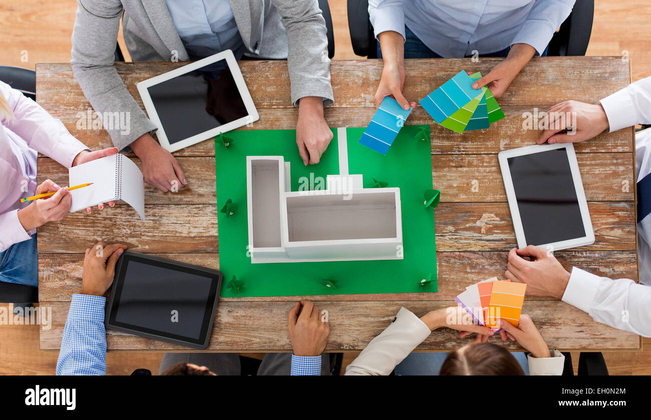 close up of business team with project layout Stock Photo - Alamy