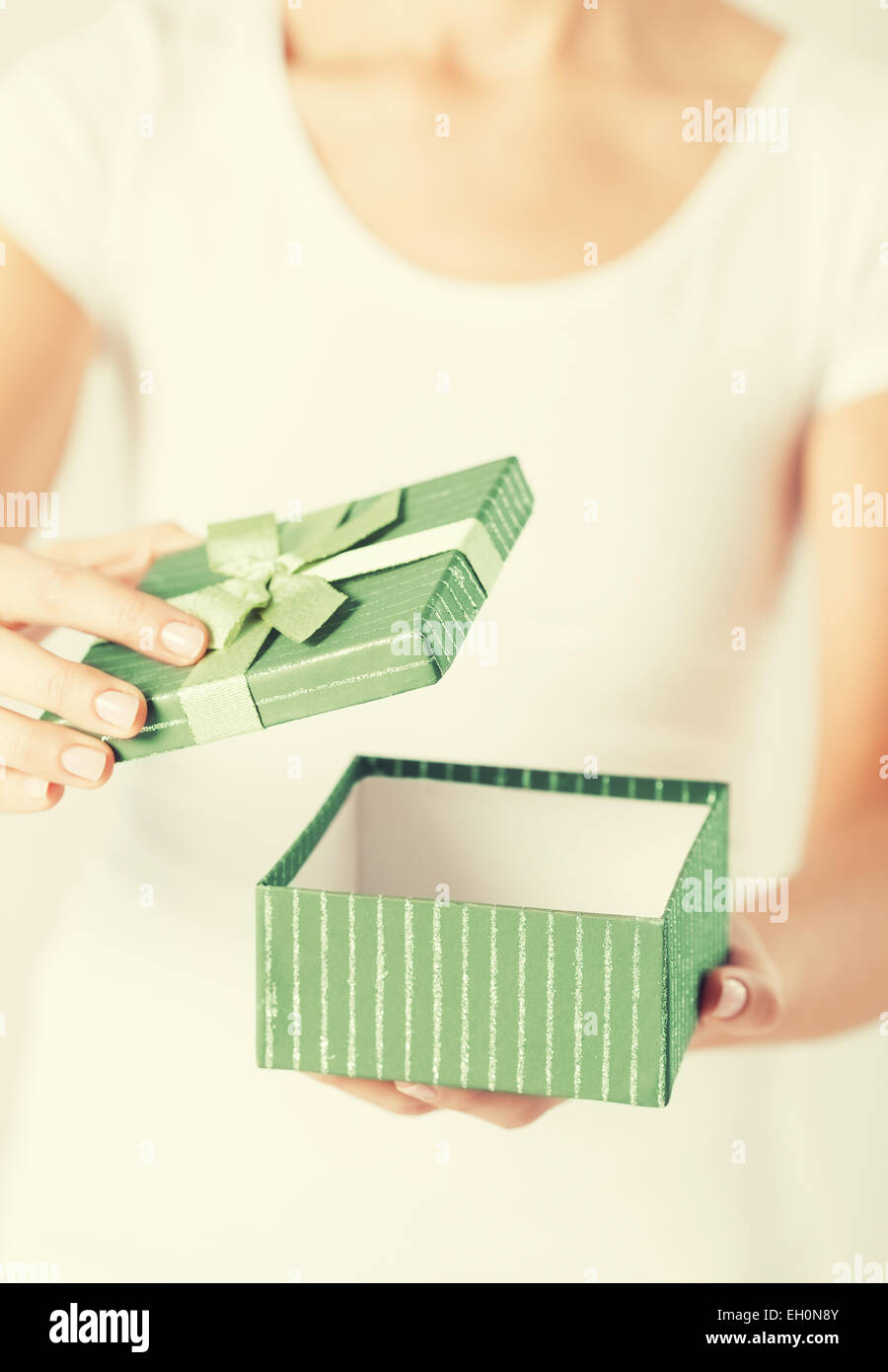 woman hands with gift box Stock Photo - Alamy