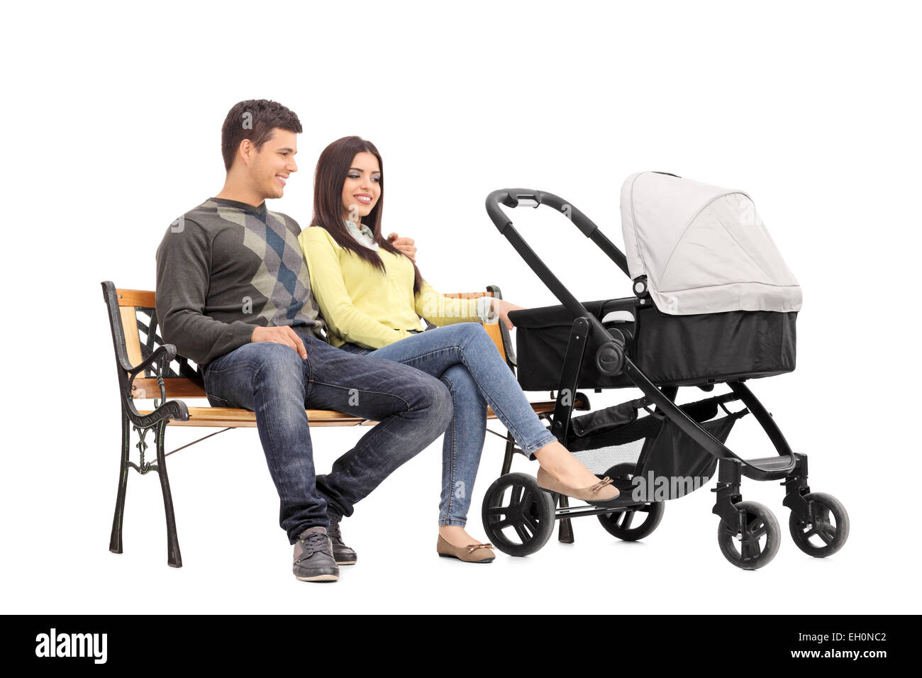 Baby girl sitting on bench hi-res stock photography and images - Alamy