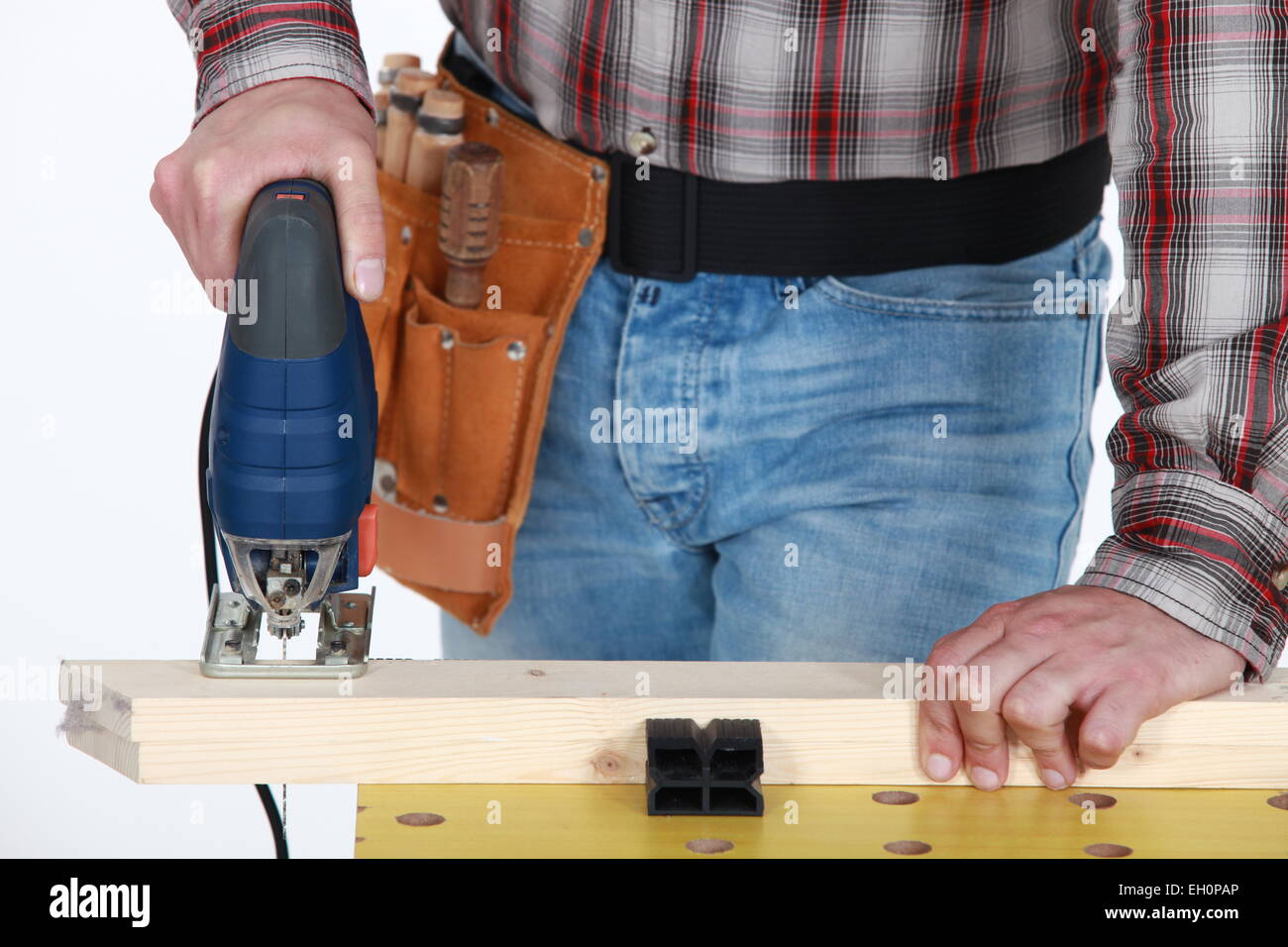 Man using band saw Stock Photo - Alamy