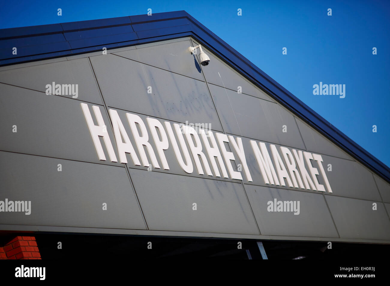 Sign for Harpurhey shopping centre Market place in North Manchester ...