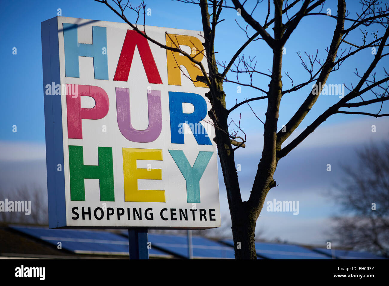 Sign for Harpurhey shopping centre in North Manchester Stock Photo - Alamy