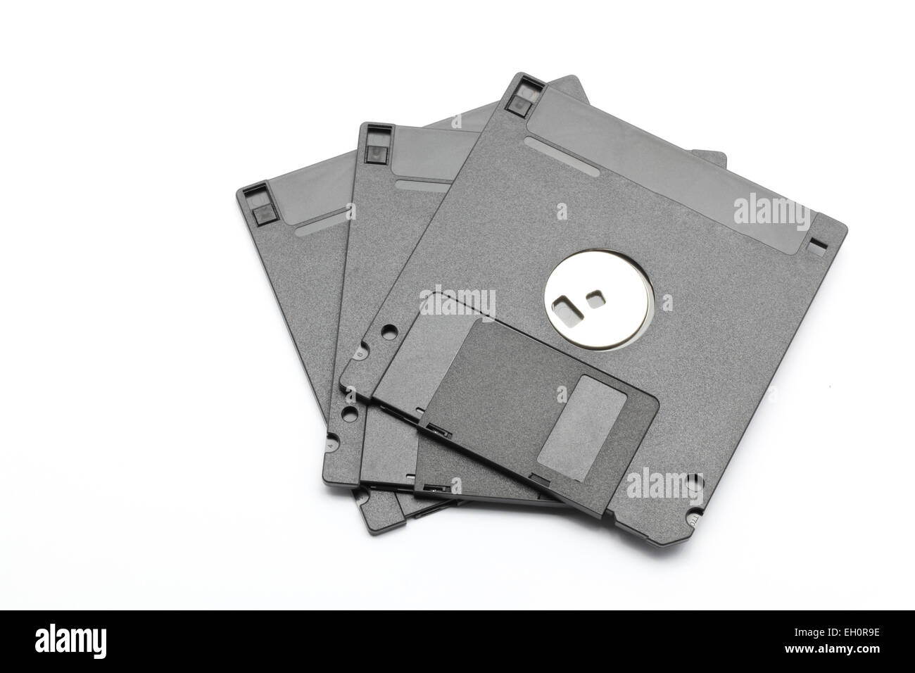 Floppy disk magnetic computer data storage support over white ...