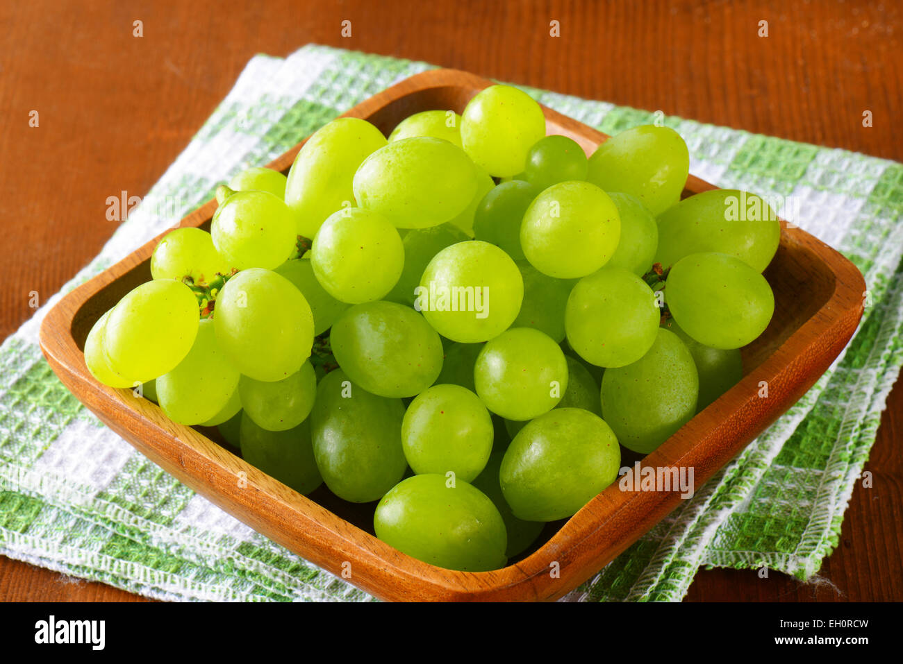 Fresh white grapes in square wooden bowl Stock Photo - Alamy