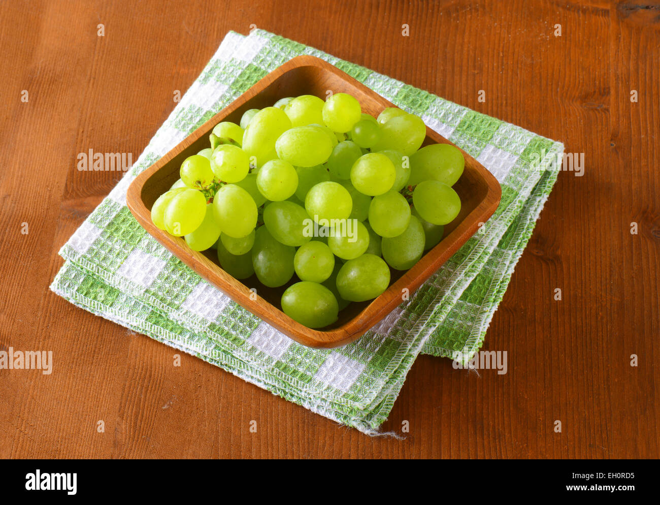 Fresh white grapes in square wooden bowl Stock Photo - Alamy