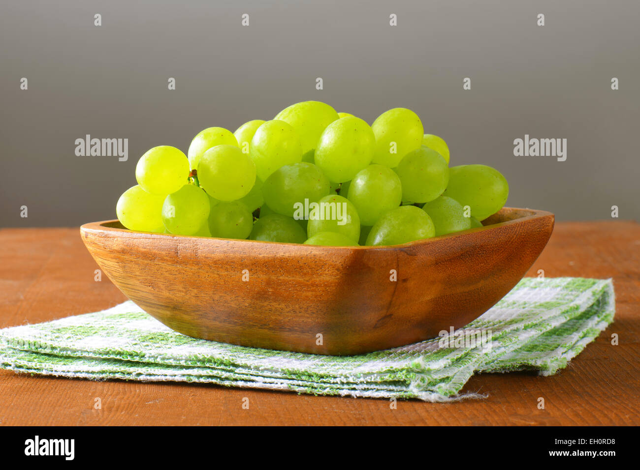 Fresh white grapes in square wooden bowl Stock Photo - Alamy