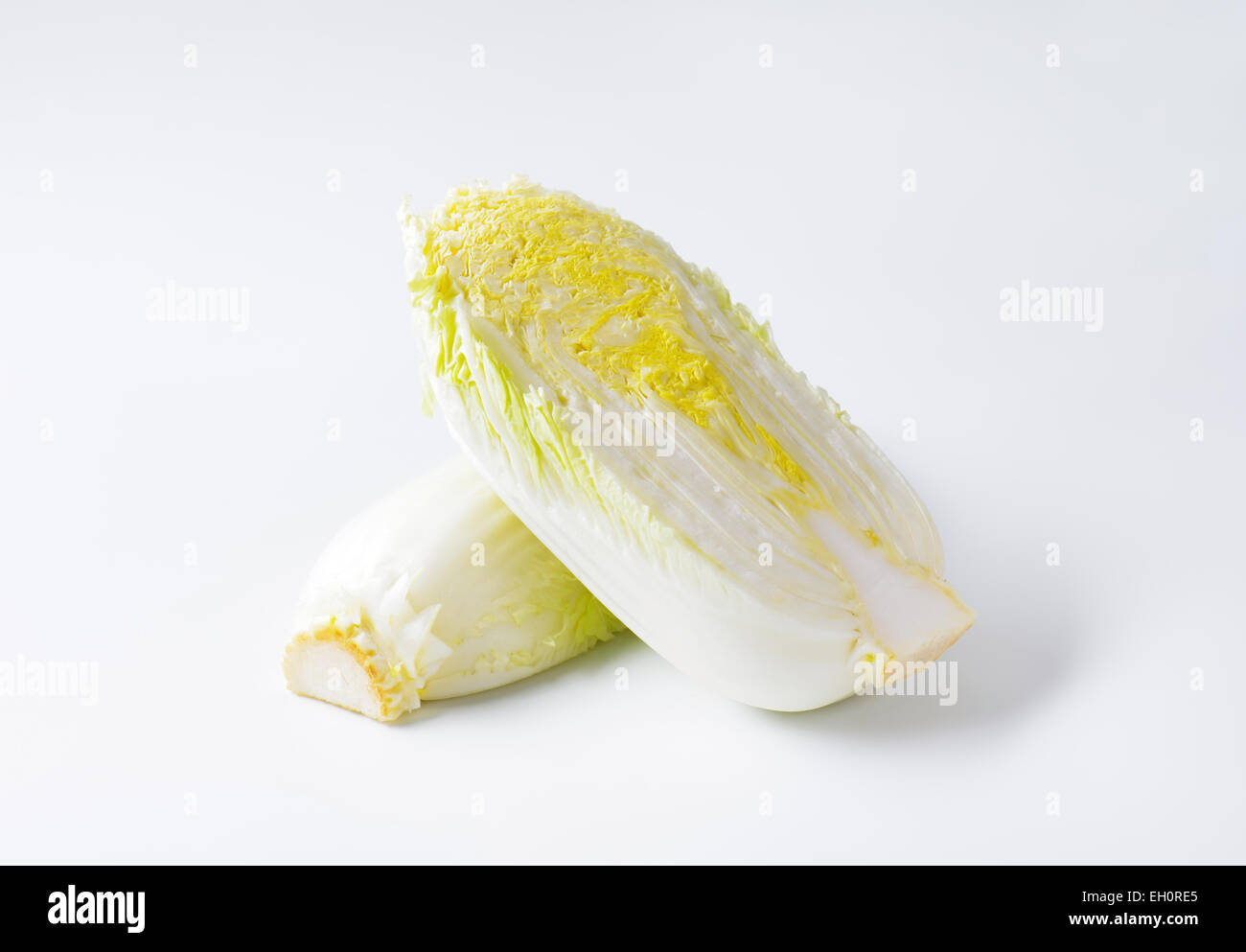 Head of fresh napa cabbage cut into halves Stock Photo - Alamy