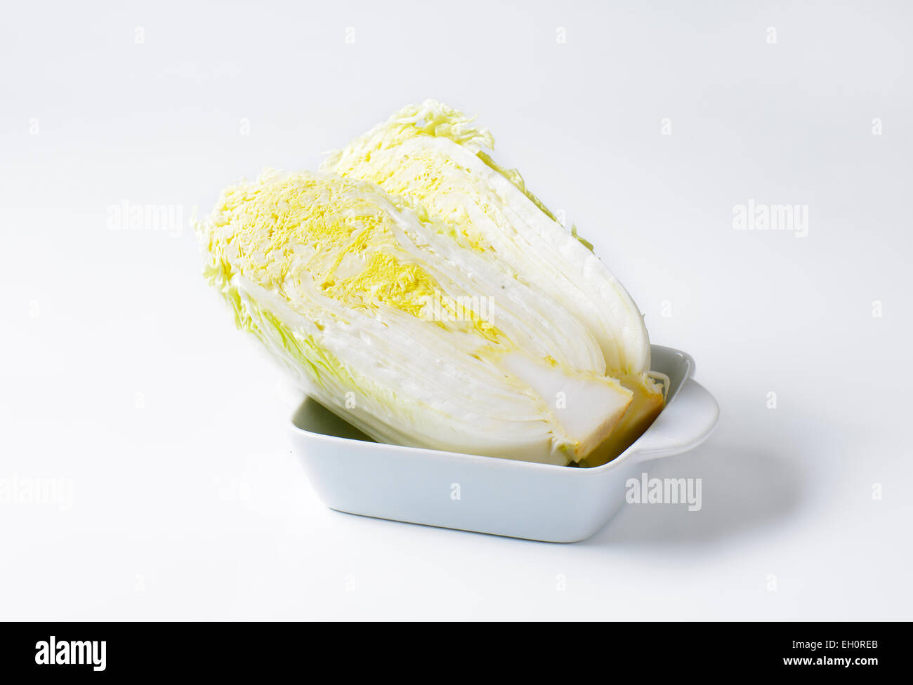Head of fresh napa cabbage cut into halves Stock Photo - Alamy