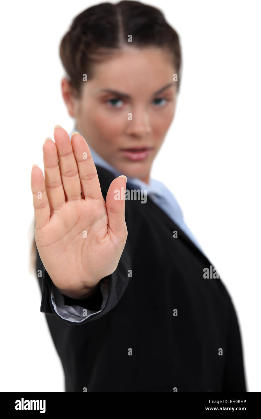 Businesswoman making stop gesture Stock Photo - Alamy