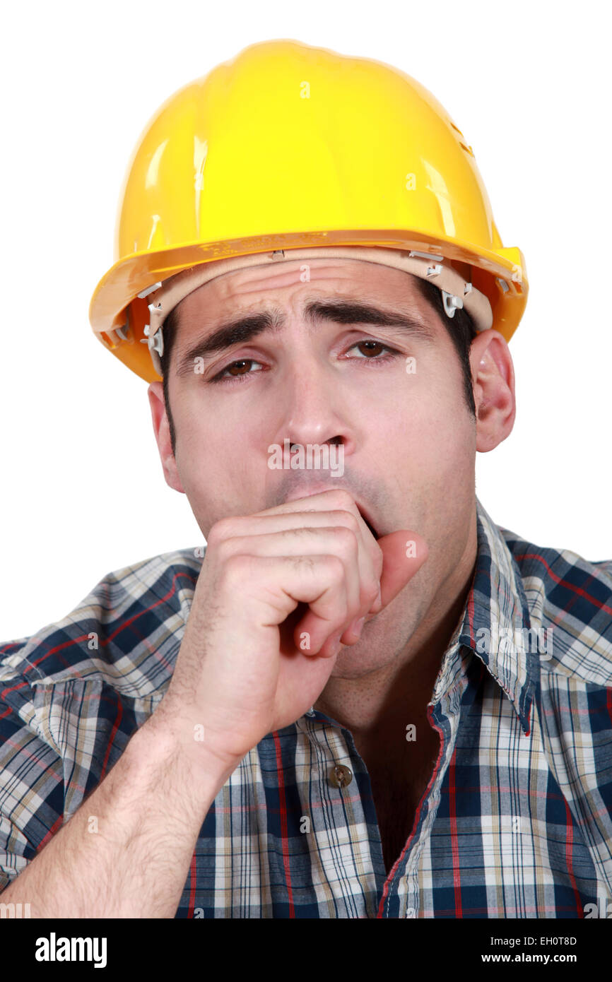 Construction worker yawning Stock Photo - Alamy