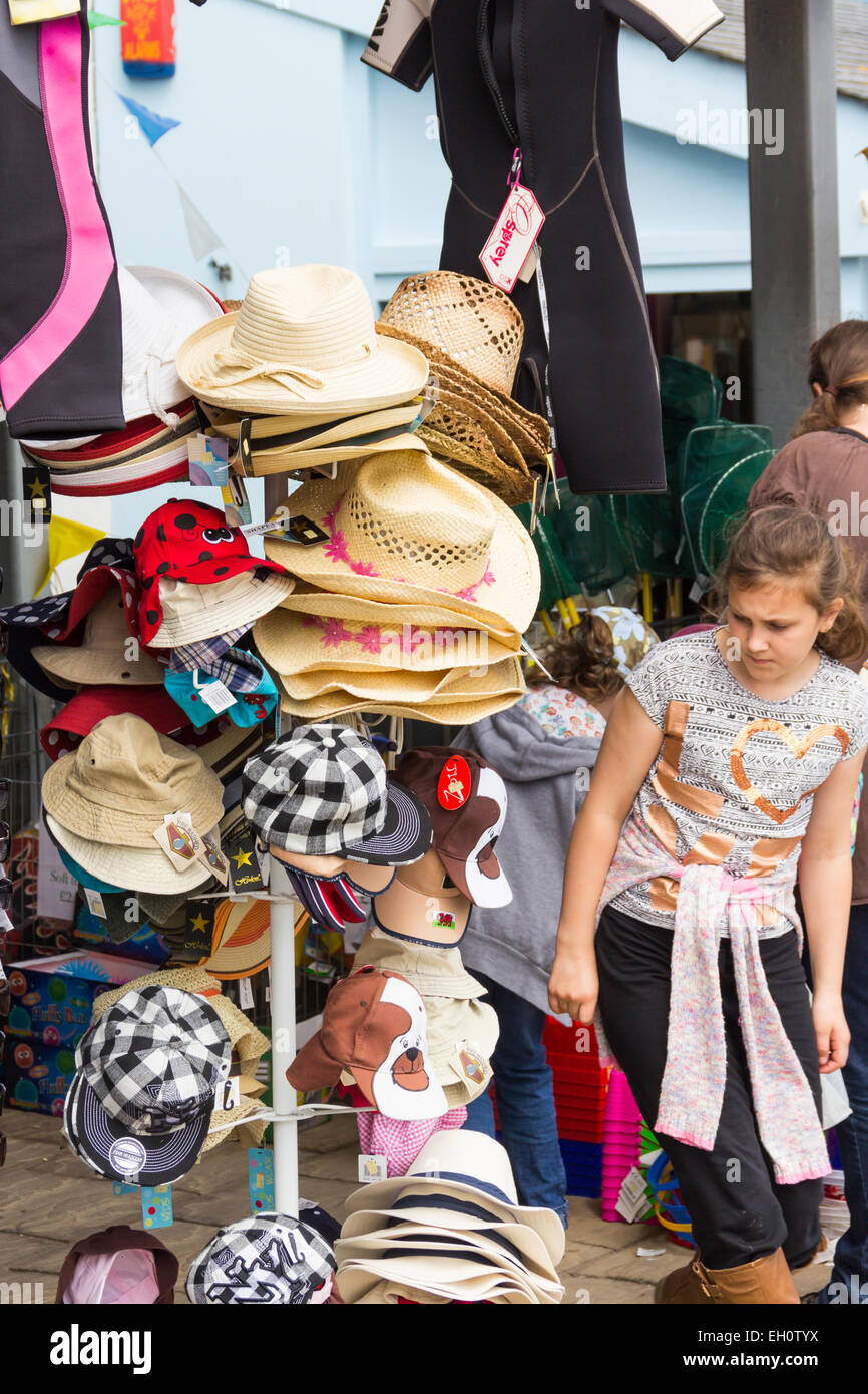 Girl looking at hat display at the Box of Delights fancy goods shop in ...