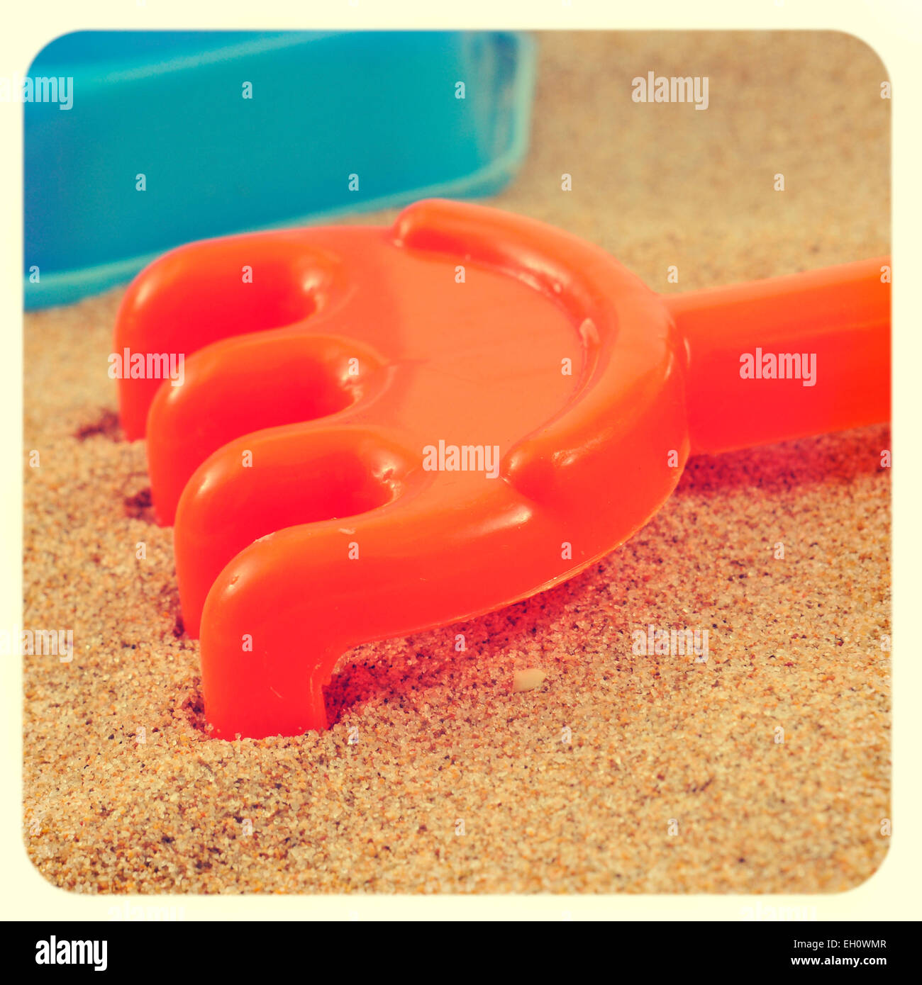 Toy sand rake hi-res stock photography and images - Alamy