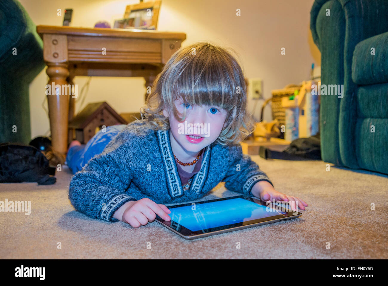 Young boy with ipad Stock Photo - Alamy