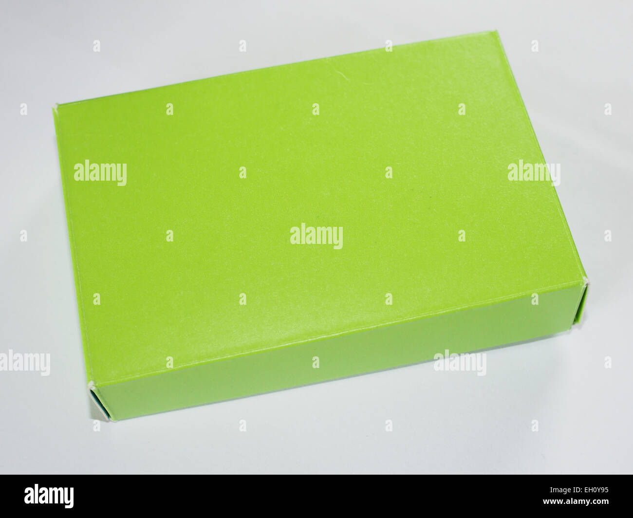 Green yellow paper box packet Stock Photo - Alamy