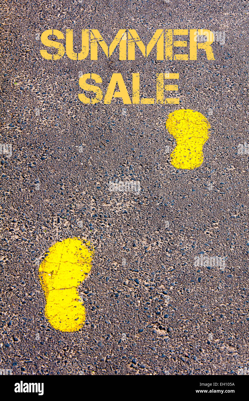 Yellow footsteps on sidewalk towards Summer Sale message.Conceptual ...