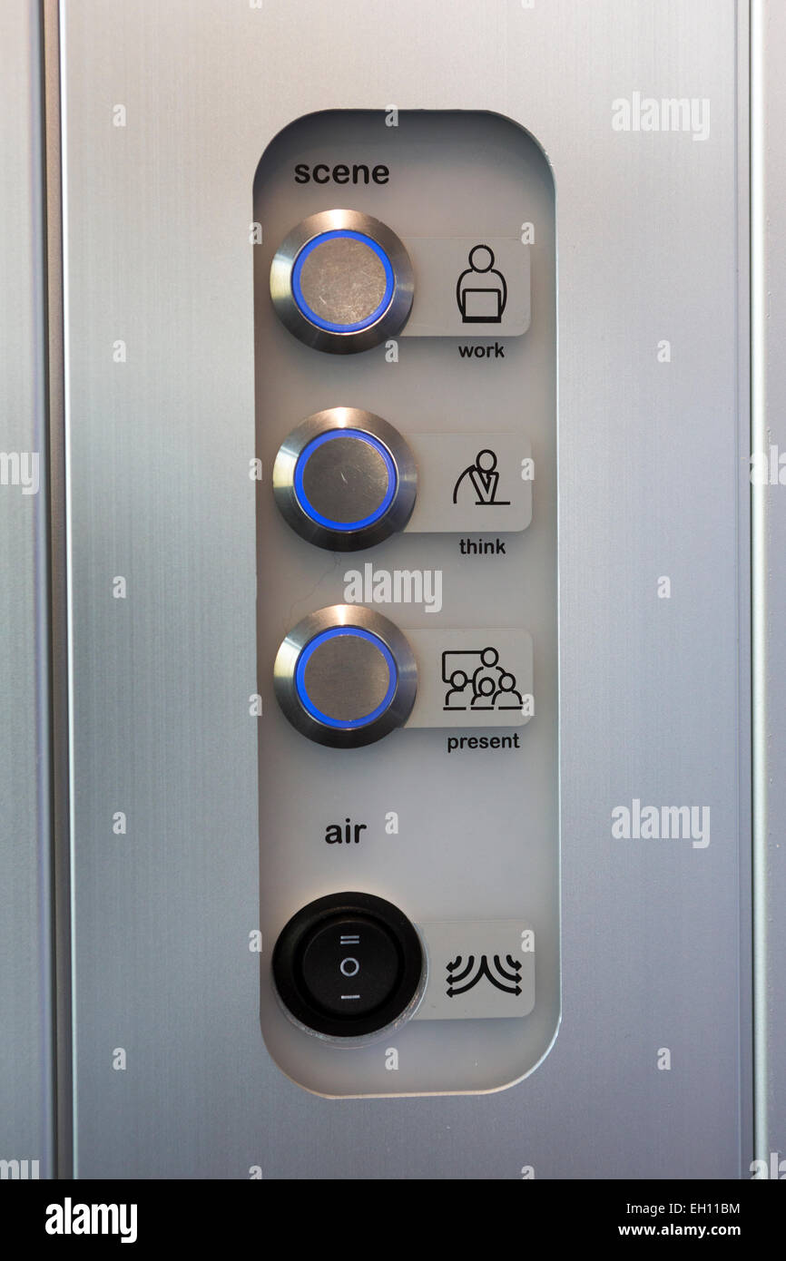 Control panel for a meeting pod in a modern office interior with open ...