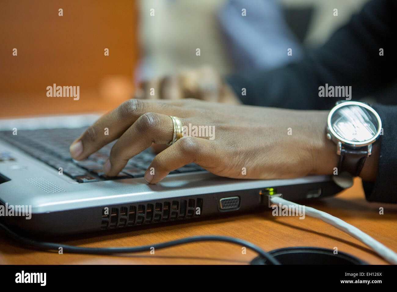 Lagos, Nigeria; Using a laptop computer in a city office Stock Photo ...