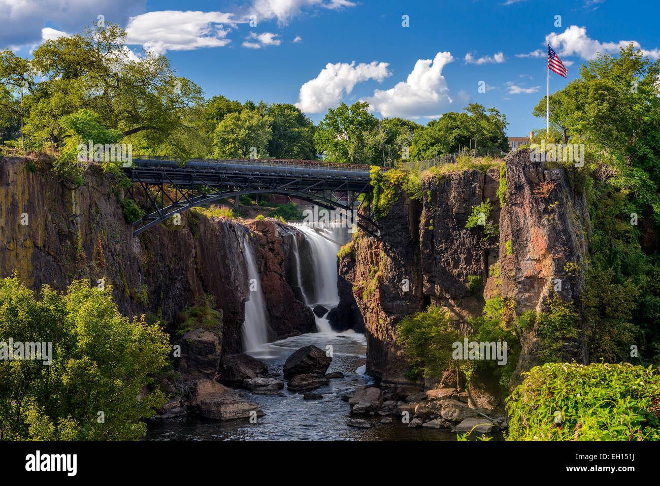 beautiful waterfall end steel bridge in forest, autumn landscape Stock ...