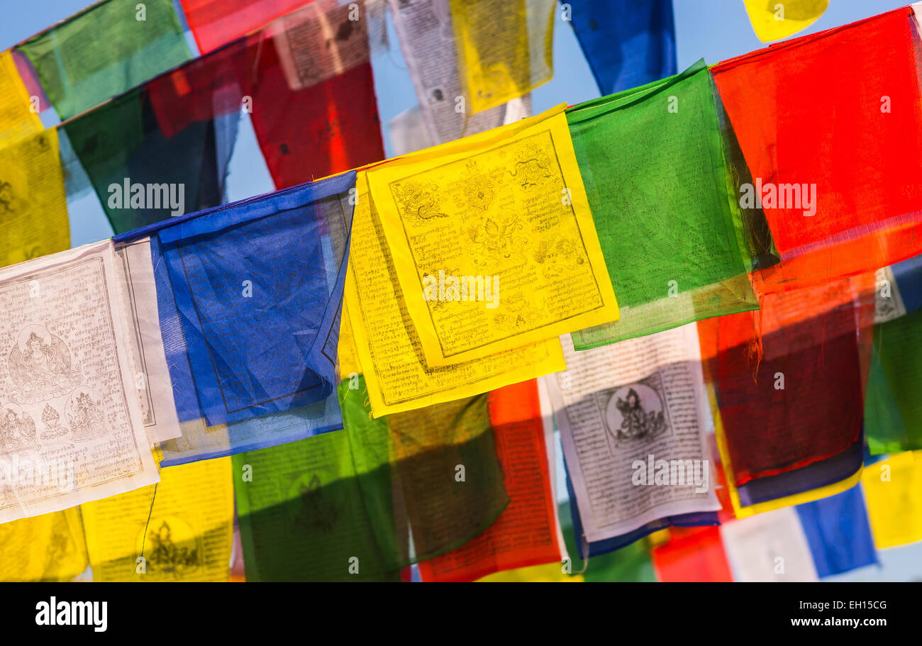 Colorful buddhist Prayer flags and blue sky. religion in Asia Stock ...