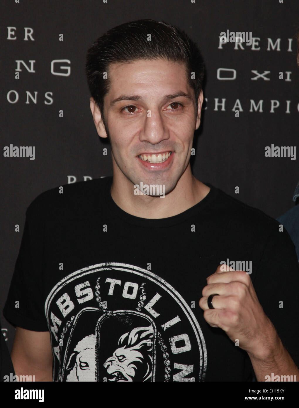 Las Vegas, Nevada, USA. 4th Mar, 2015. Boxer John Molina jr holds a ...
