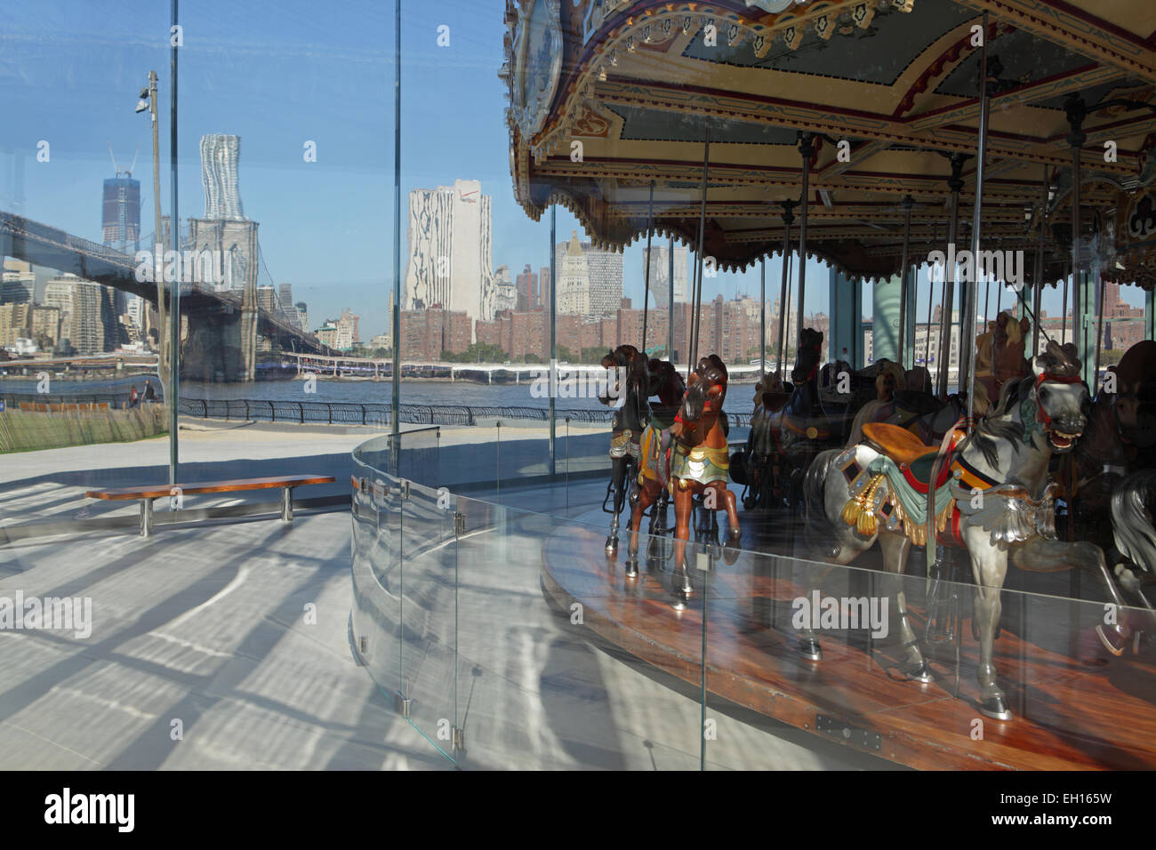 Jane's Carousel in Brooklyn Bridge Park with the Brooklyn Bridge in the ...