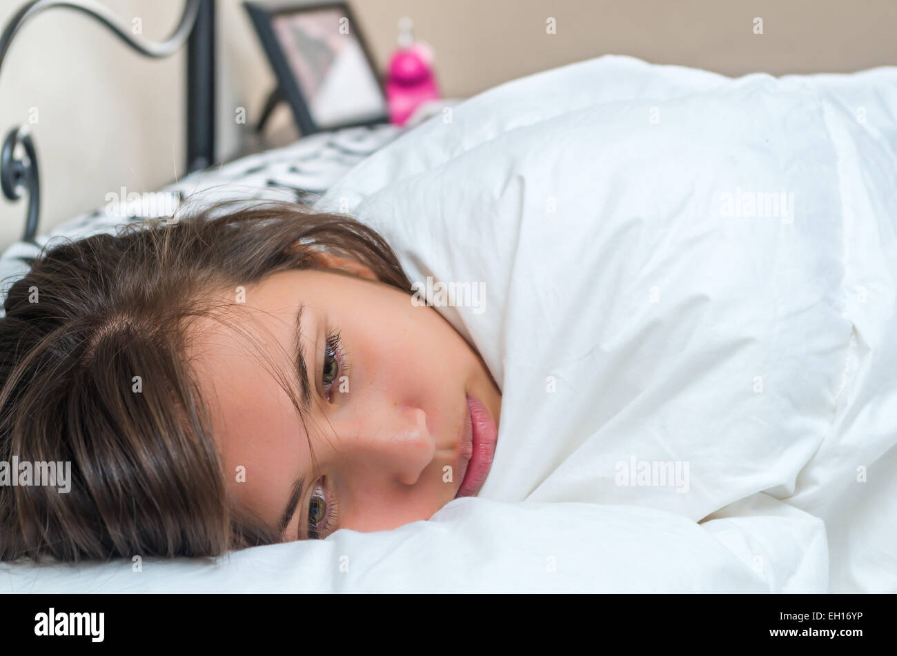 Pretty teen girl waking up hi-res stock photography and images - Alamy