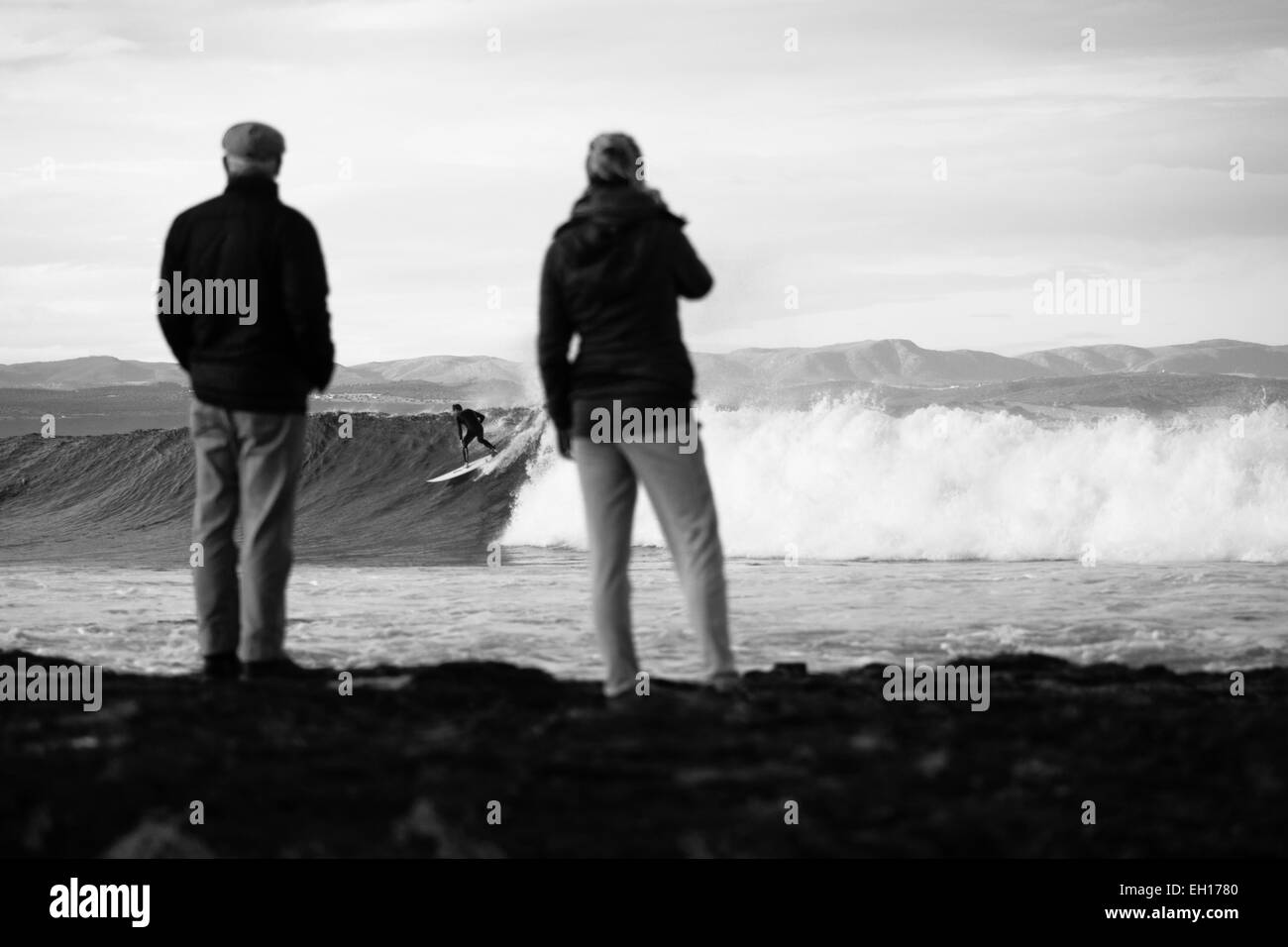 People watching surfing Stock Photo - Alamy
