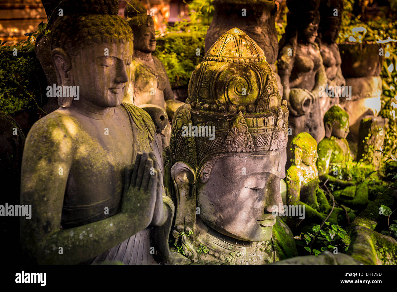 The old stone statue. Indonesia, Bali Stock Photo - Alamy