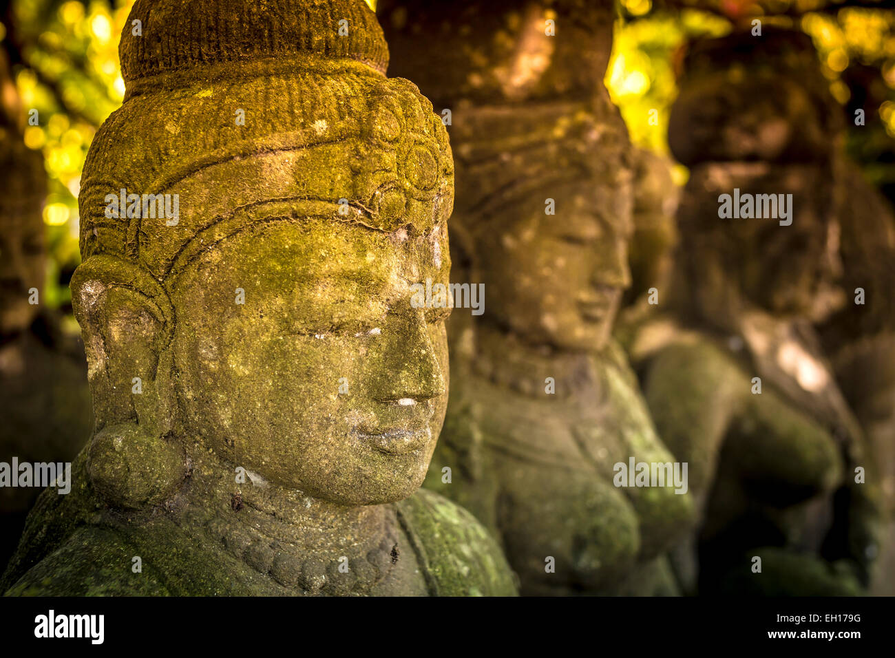 The old stone statue. Indonesia, Bali Stock Photo - Alamy