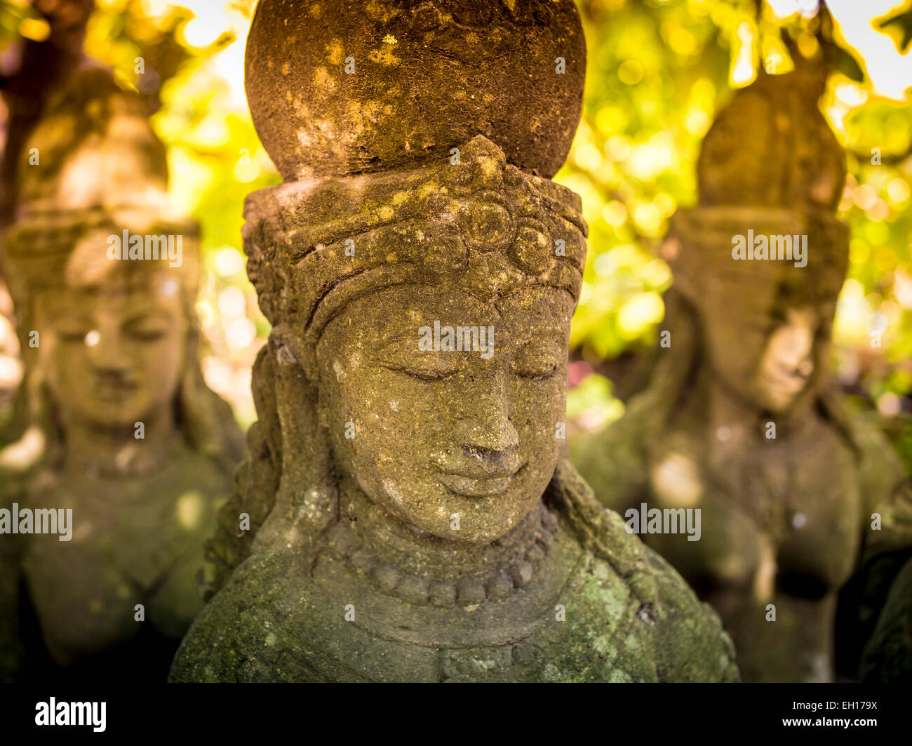 The old stone statue. Indonesia, Bali Stock Photo - Alamy
