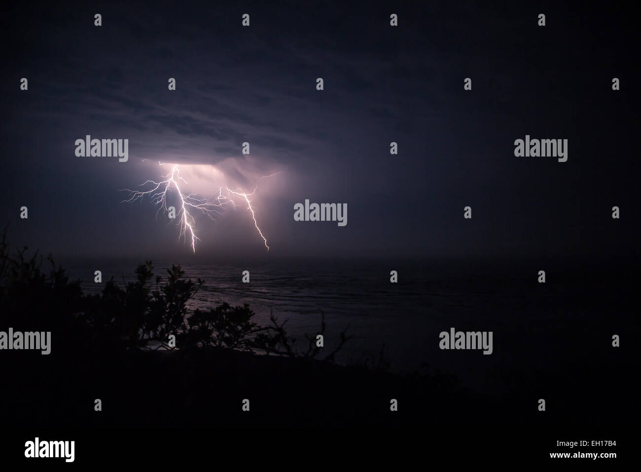 Lightning over water Stock Photo - Alamy