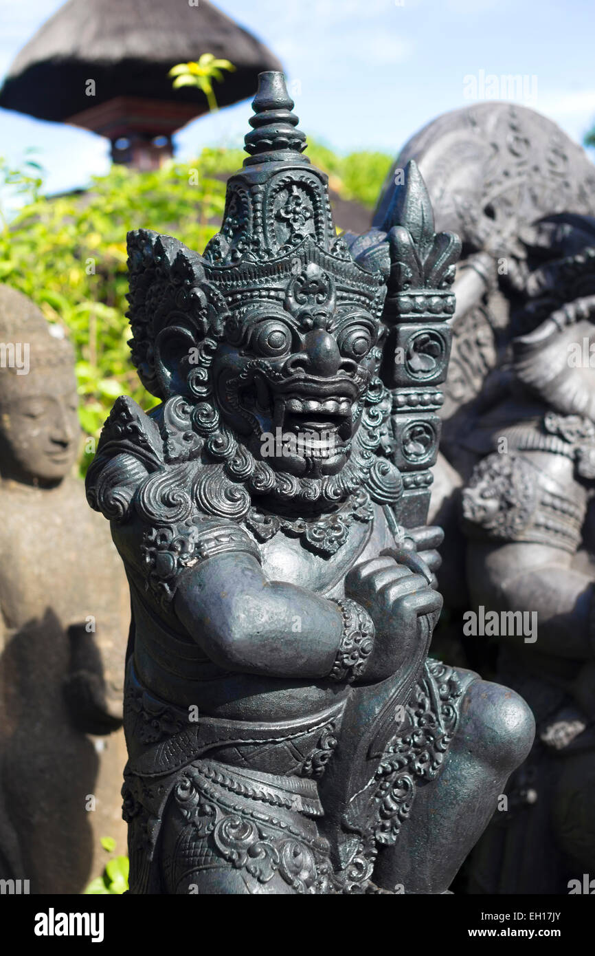 The old stone statue. Indonesia, Bali Stock Photo - Alamy