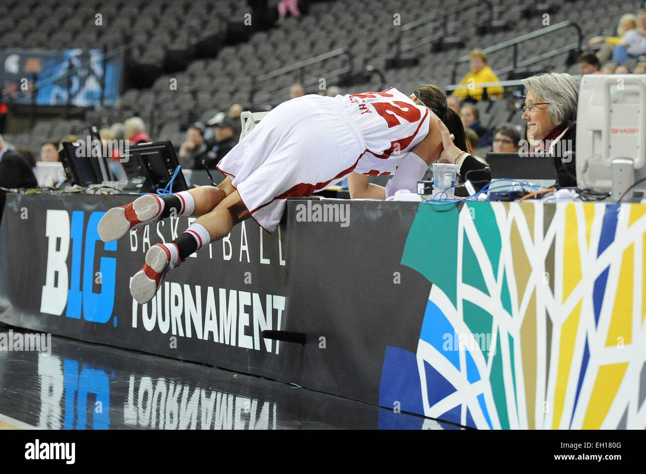 March 4, 2015: Wisconsin Badgers guard Tessa Cichy (22) goes flying ...