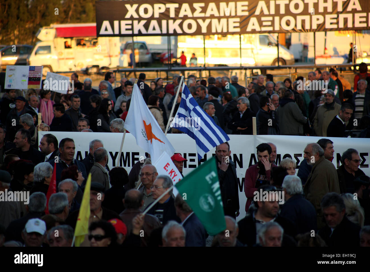 Protesters holding Cyprus and Greek Flags in the demonstration outside ...