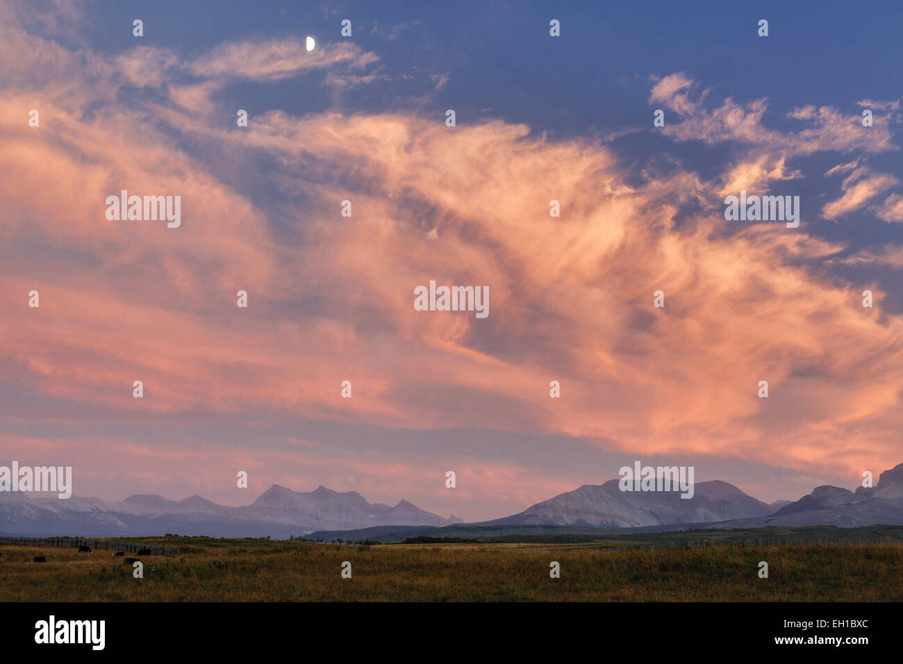 Sunset over mountains of Waterton Lakes National Park, from ...
