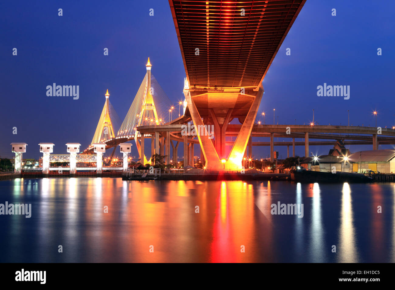 Mega Bhumibol Industrial Ring Bridge at dusk in Thailand. The bridge ...