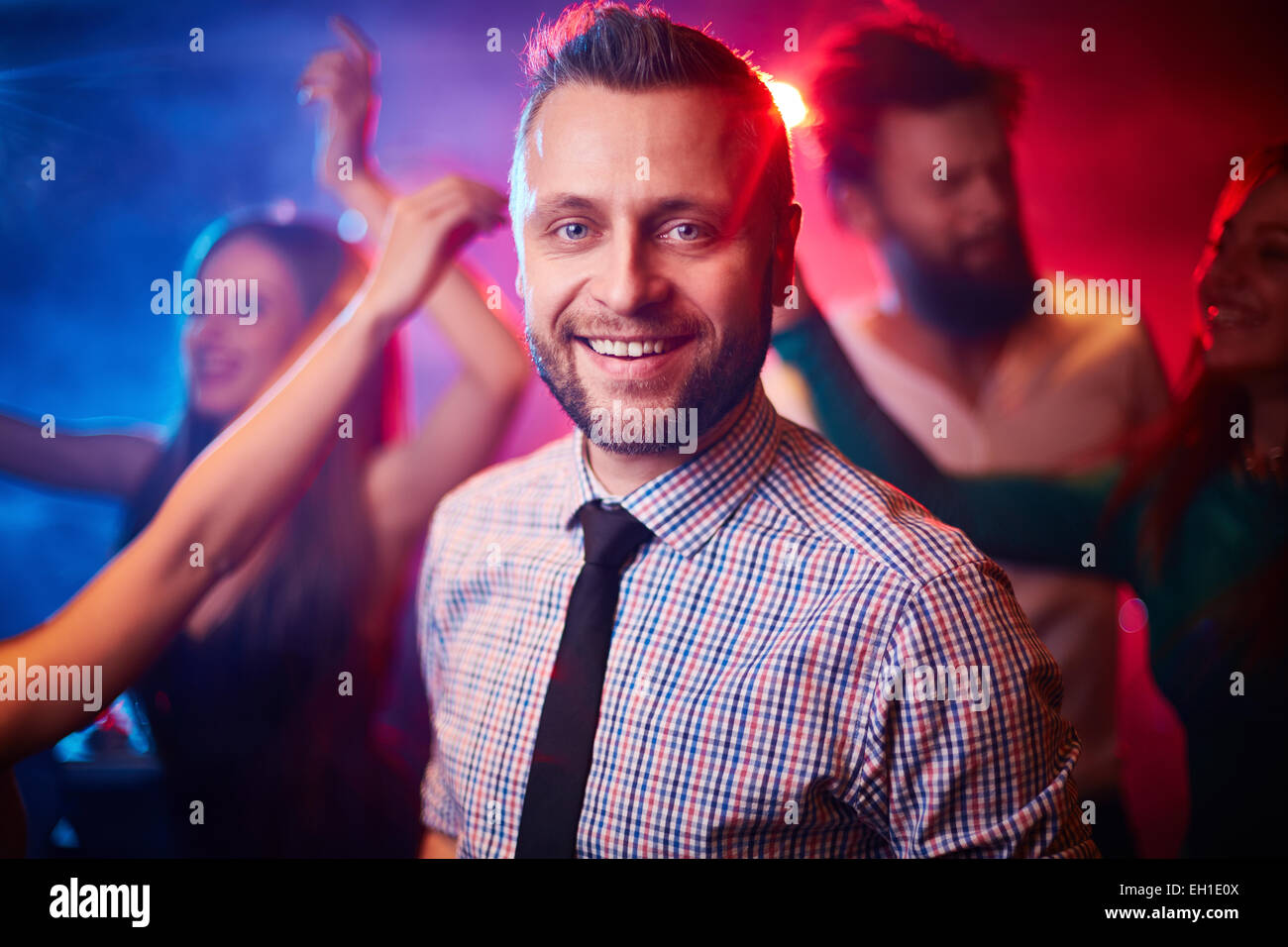 Portrait of a young man in the club Stock Photo - Alamy