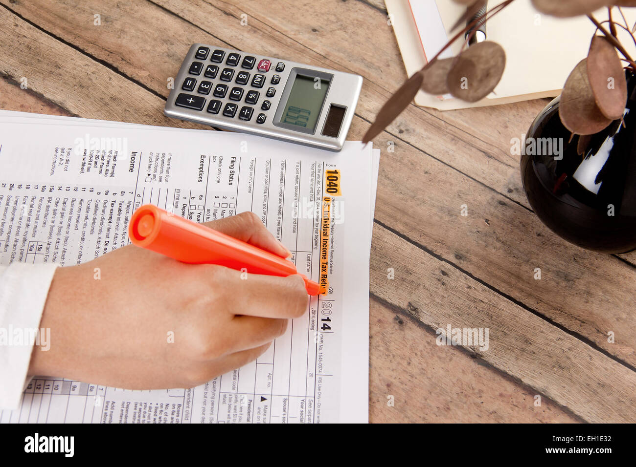 business woman filing federal income tax form 1040 Stock Photo - Alamy