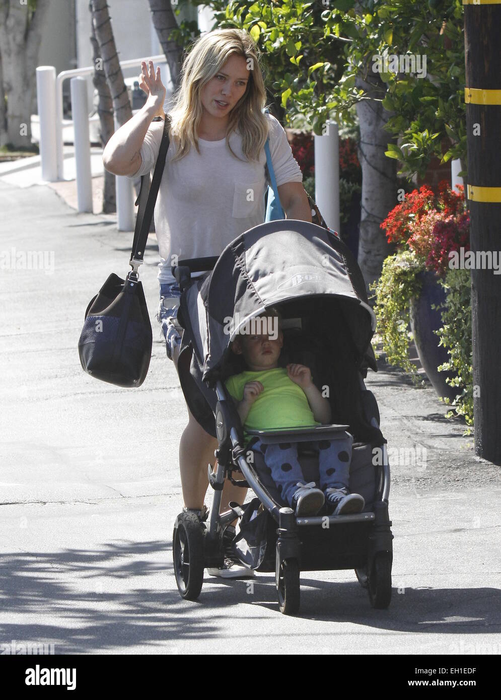 Hilary Duff visits the Fred Segal store Featuring: Hilary Duff,Luca ...
