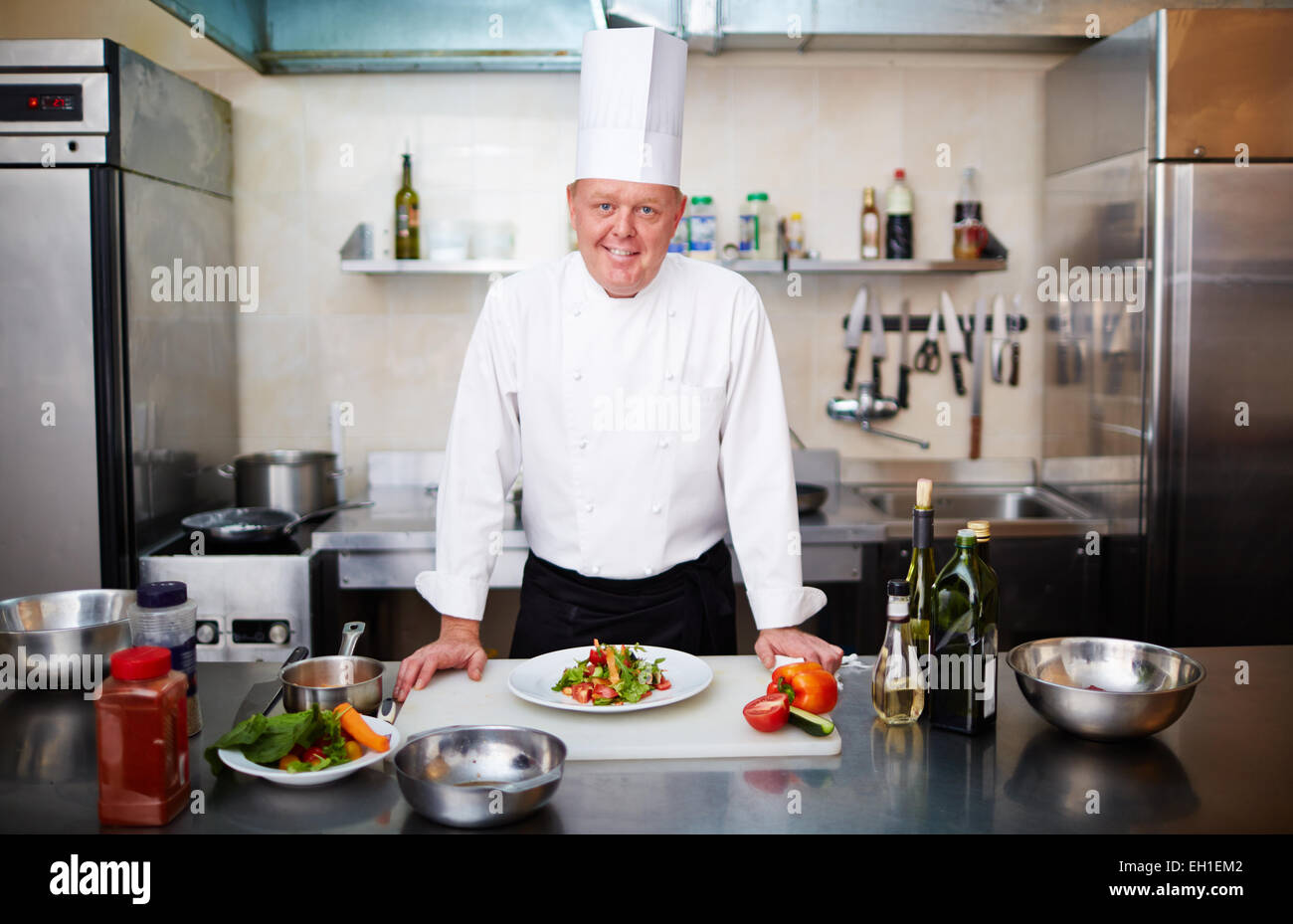 Portrait of a nature chef at his kitchen Stock Photo - Alamy