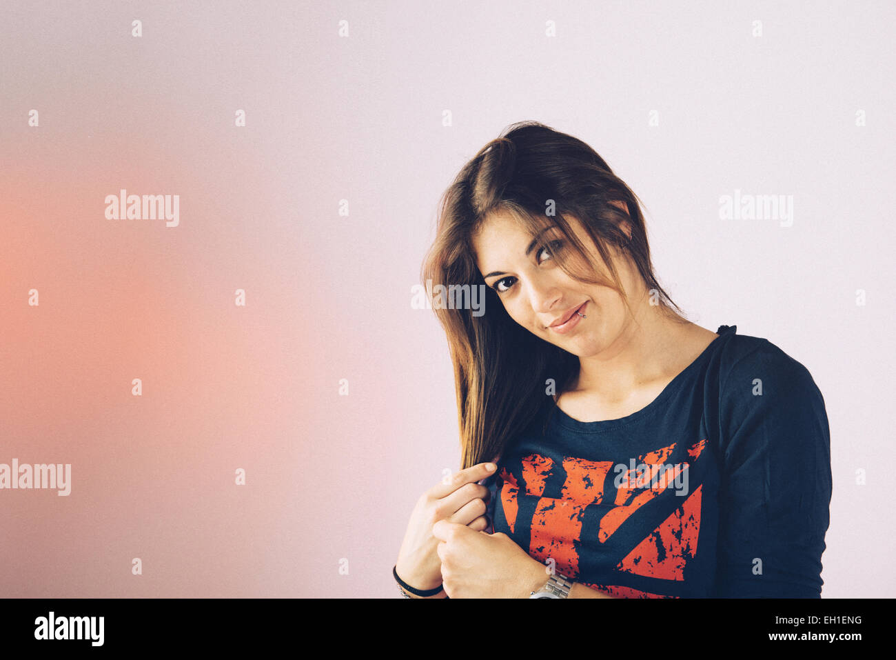 Beautiful young woman on a white background, with focus only in the ...