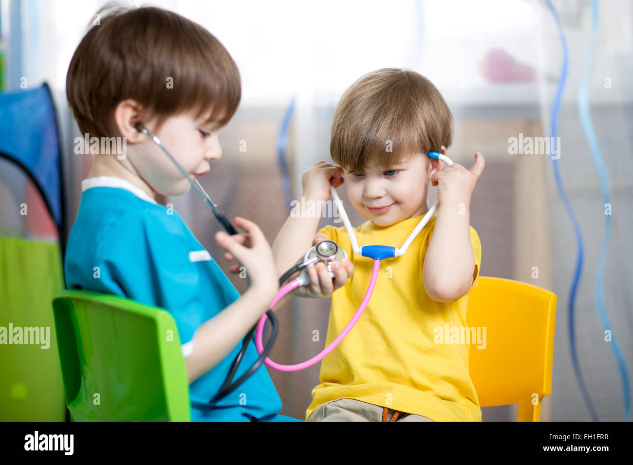 Doctor Examining Smiling Little Boys High Resolution Stock Photography ...