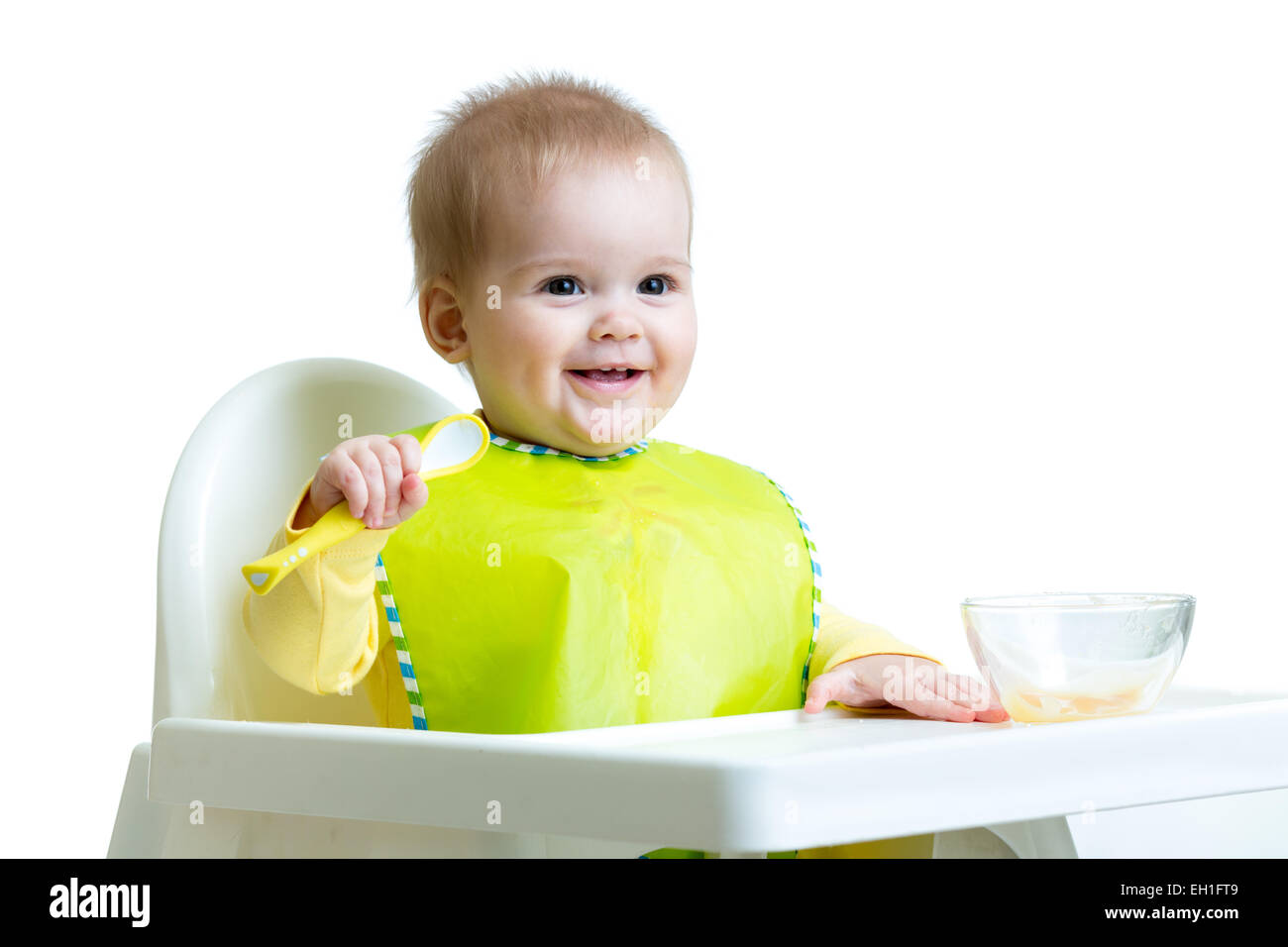 kid eating food on kitchen Stock Photo - Alamy
