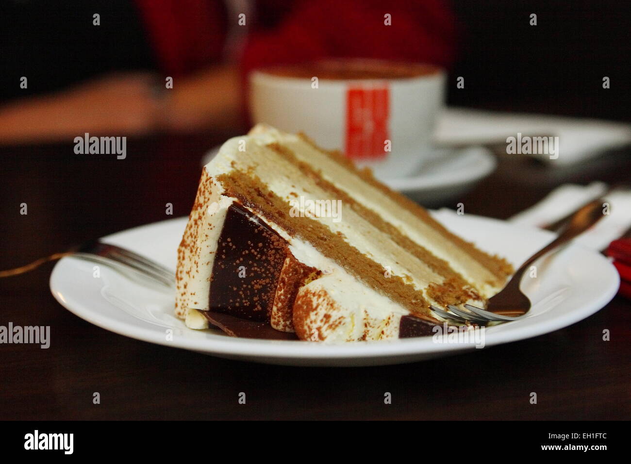 Slice of Coffee cake in a plate Stock Photo - Alamy