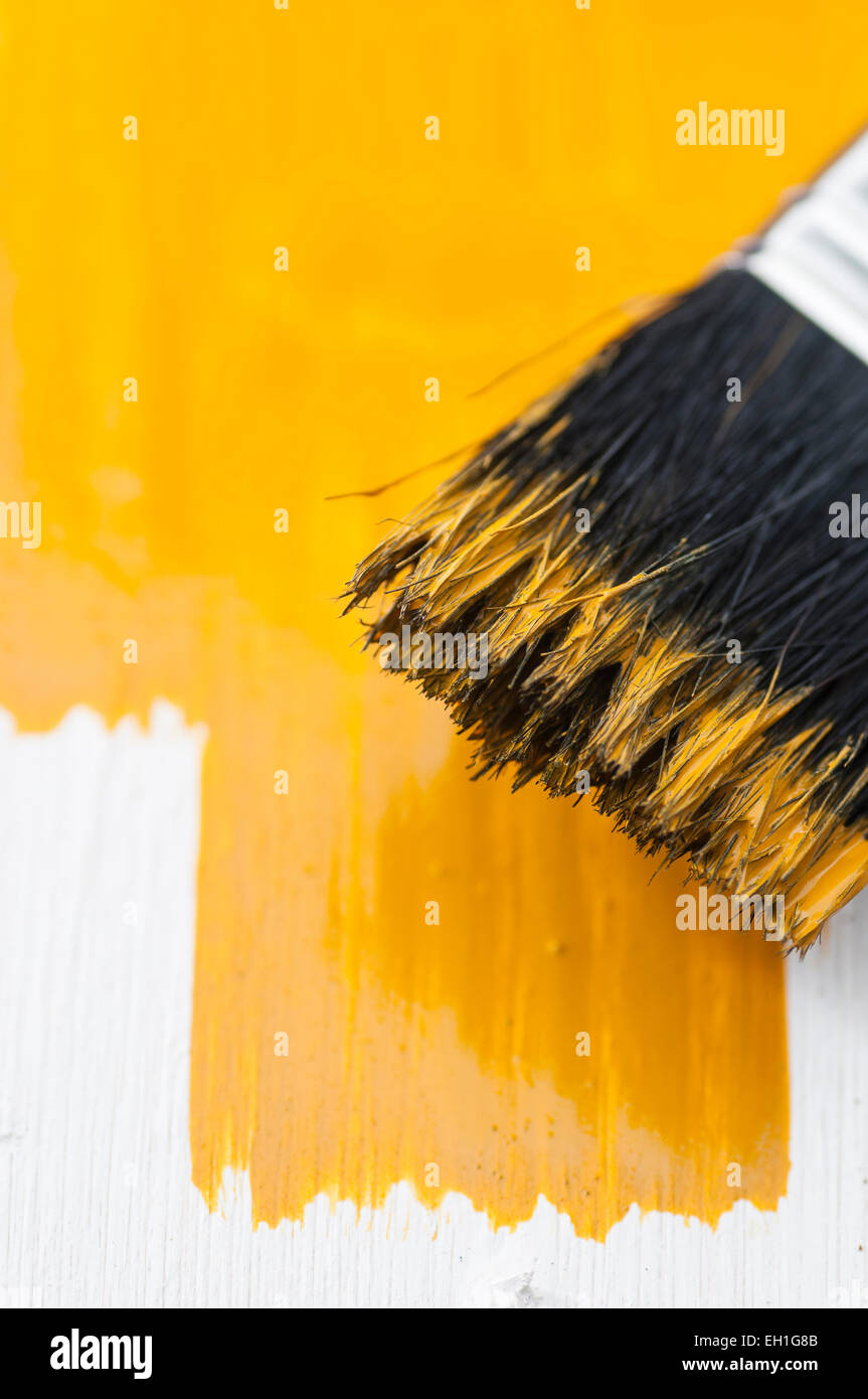 Brush painting yellow color close hi-res stock photography and images ...