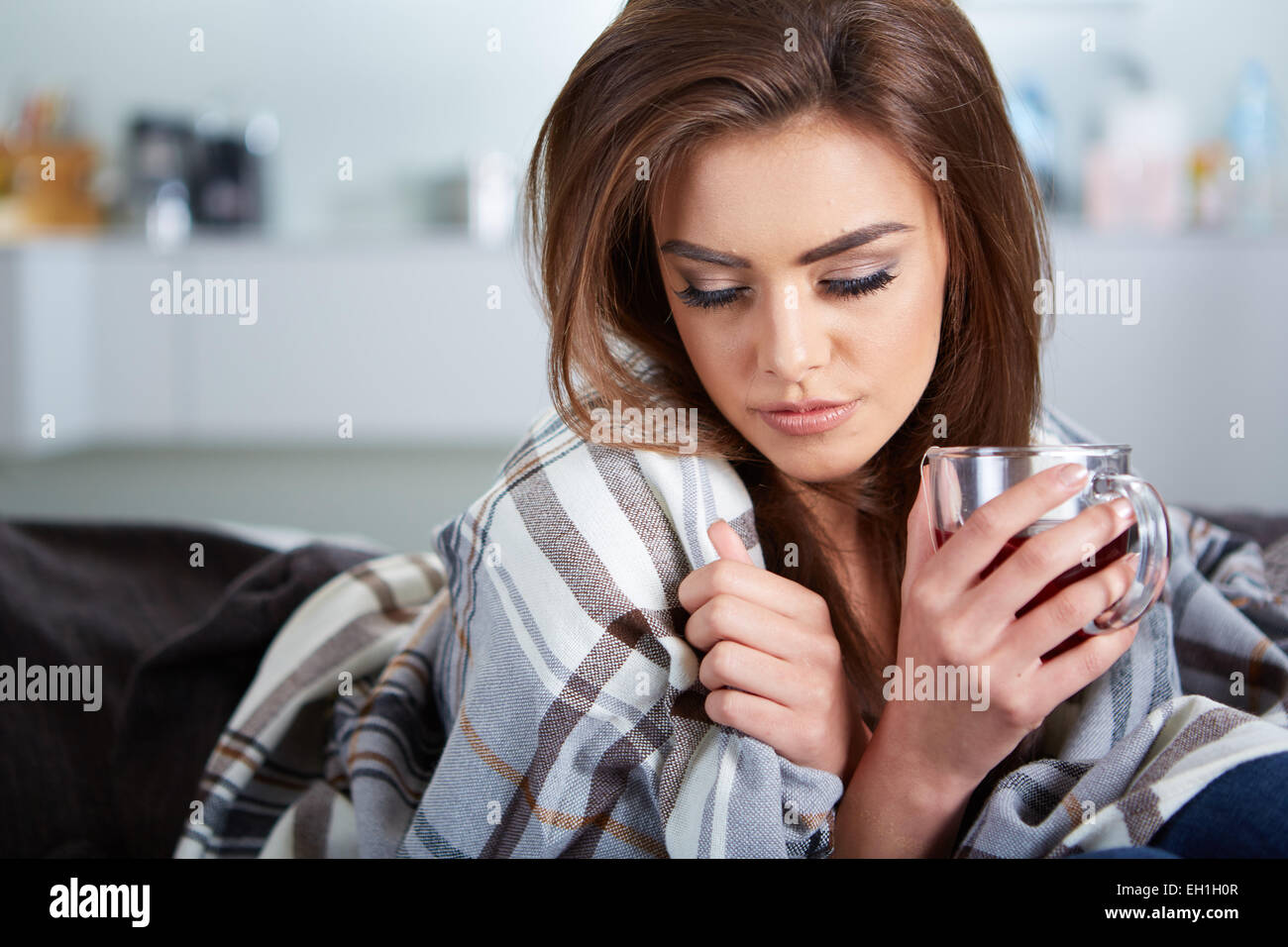 young woman caught a cold Stock Photo - Alamy