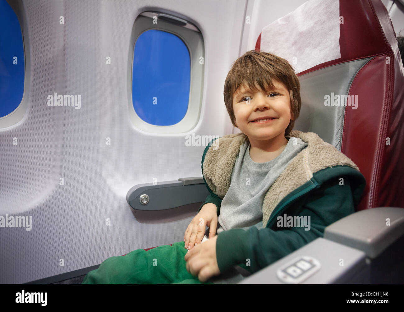 Child plane seat hi-res stock photography and images - Alamy