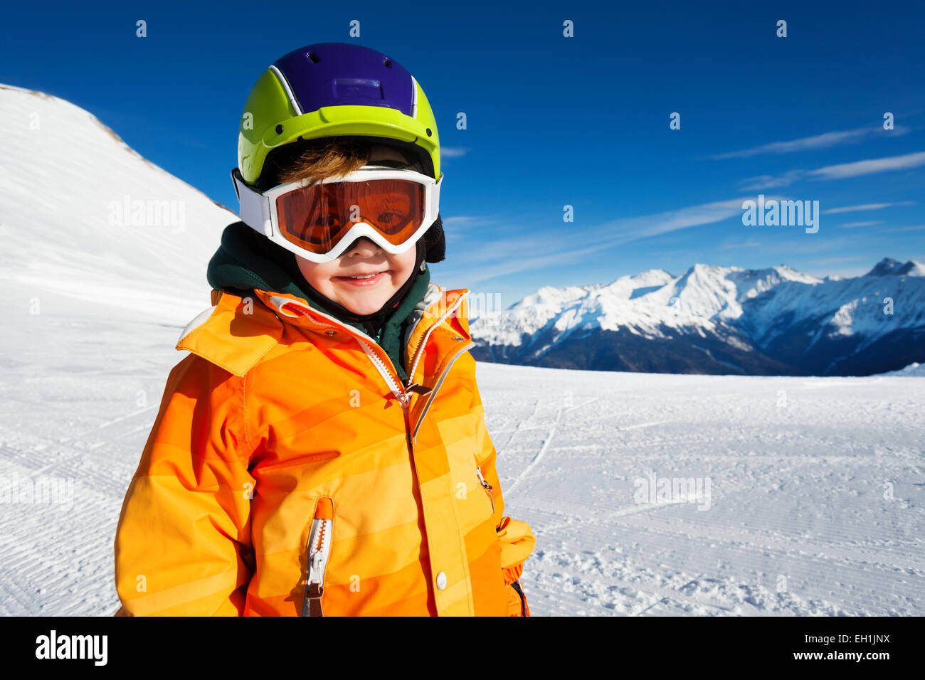 Close-up view of boy wearing ski mask on ski-track Stock Photo - Alamy