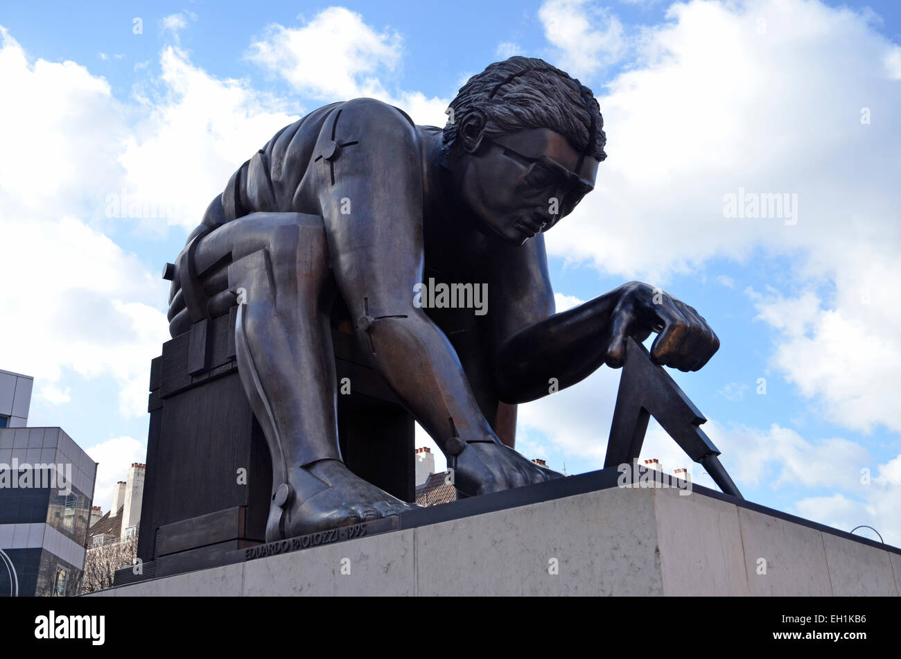 A statue of Sir Isaac Newton in the grounds of the British Library in ...