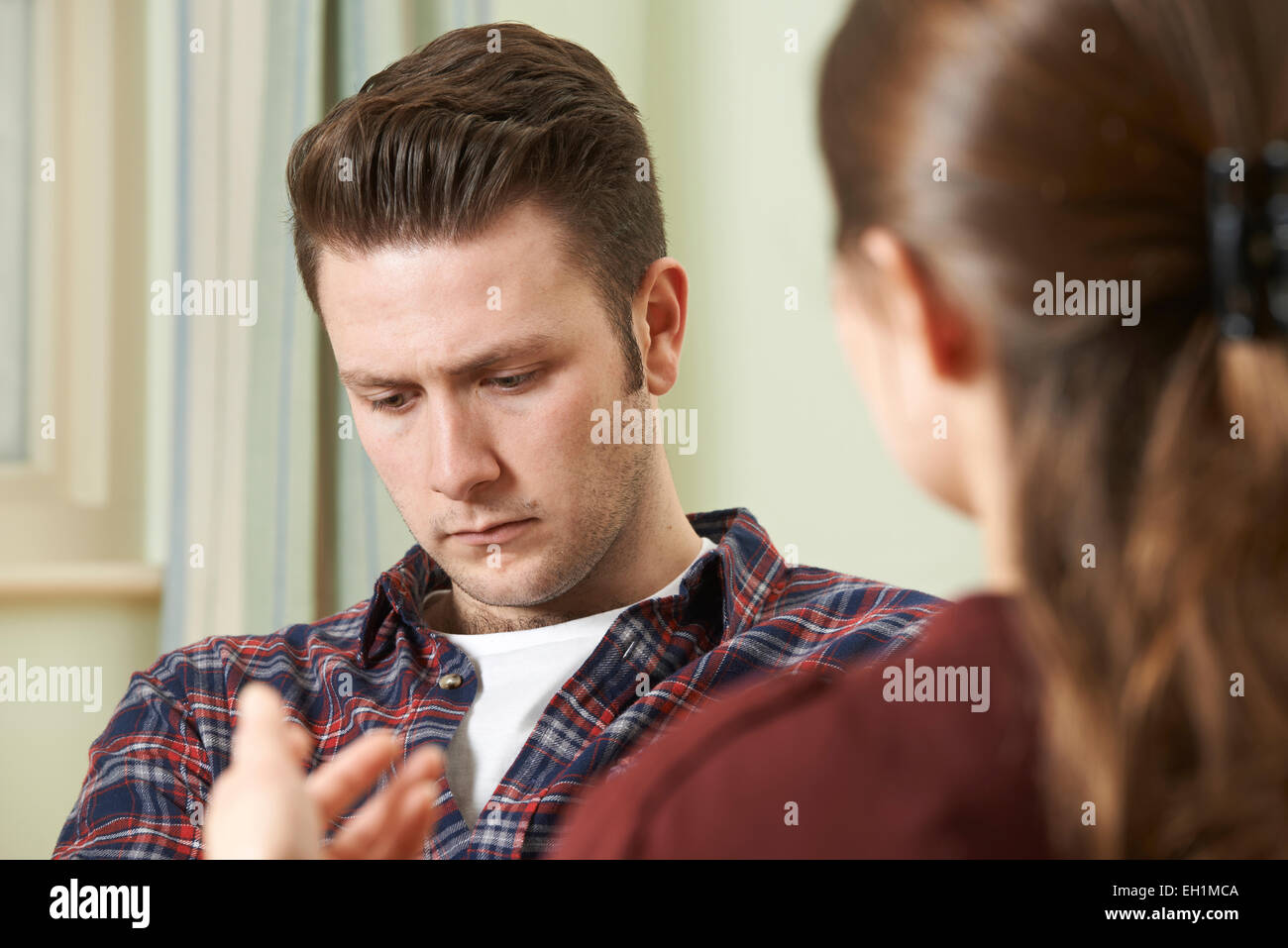 Two women talking sad hi-res stock photography and images - Alamy